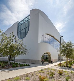 Exterior View of Library with White Facade and Large Unique Shaped ...