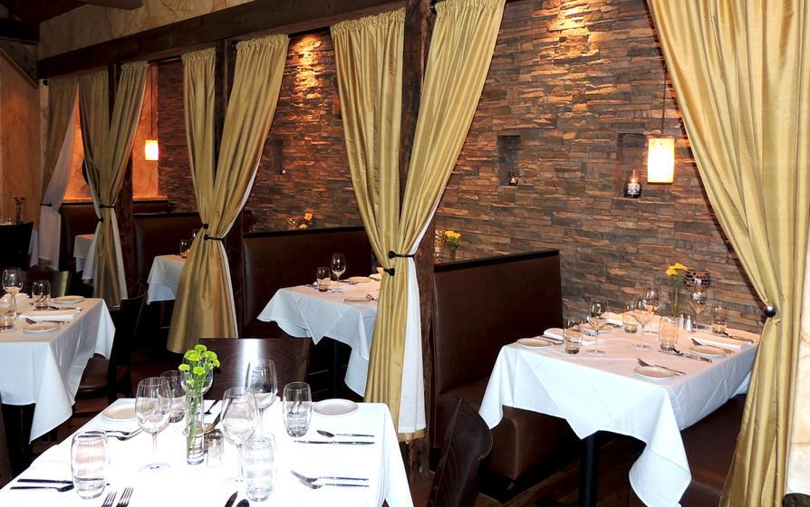 Eldorado stone the livery tavern dining area table and booth seating ...