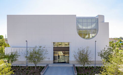 Exterior View of Library with White Facade and Large Unique Shaped ...