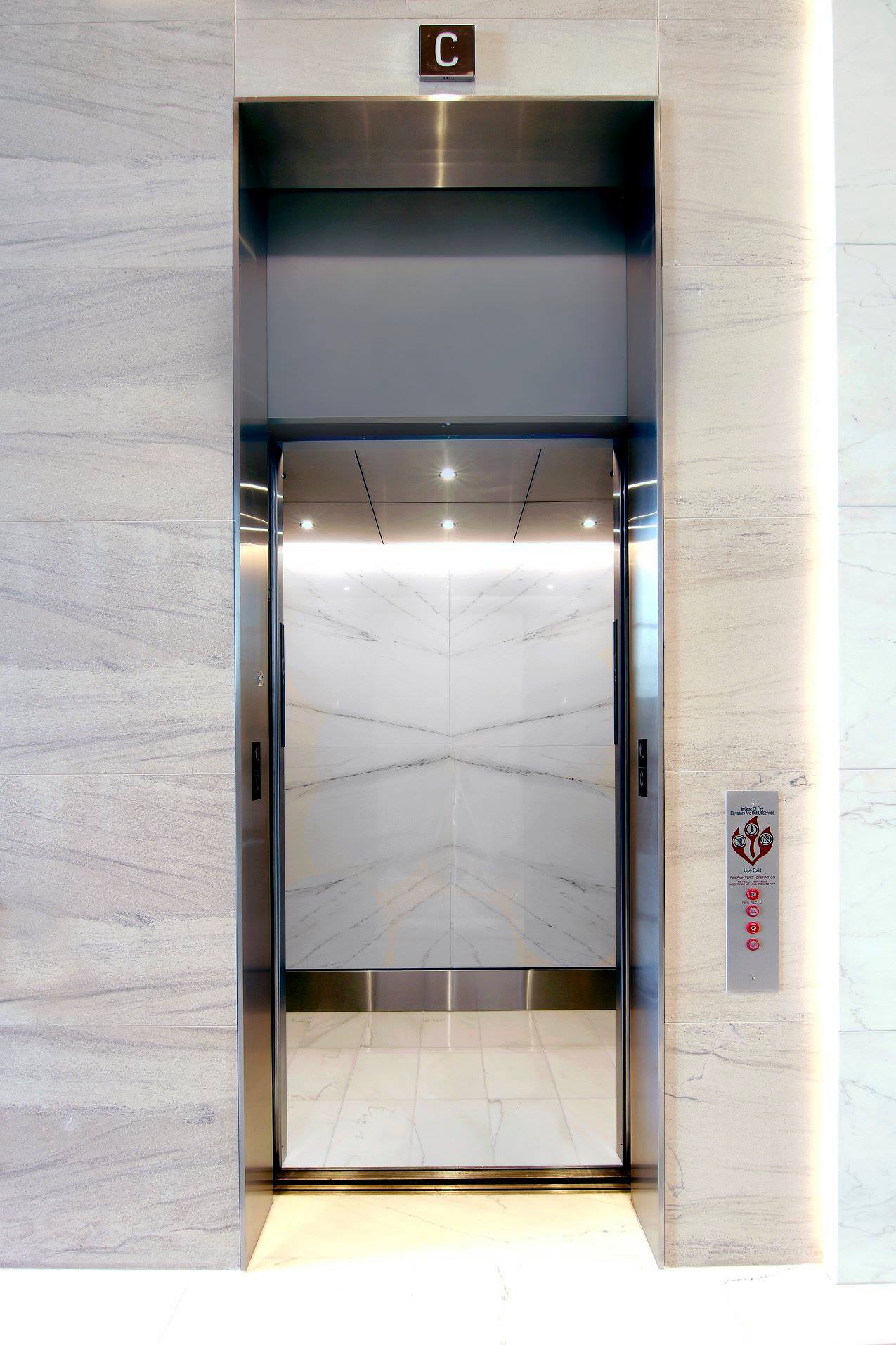 Fina Stoneworks Elevator interior granite paneling | Fina Stoneworks LLC