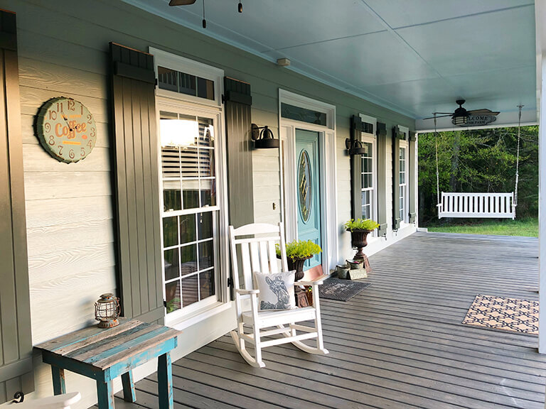 Gallery-green-board-batten-shutters-porch | Timberlane, Inc.