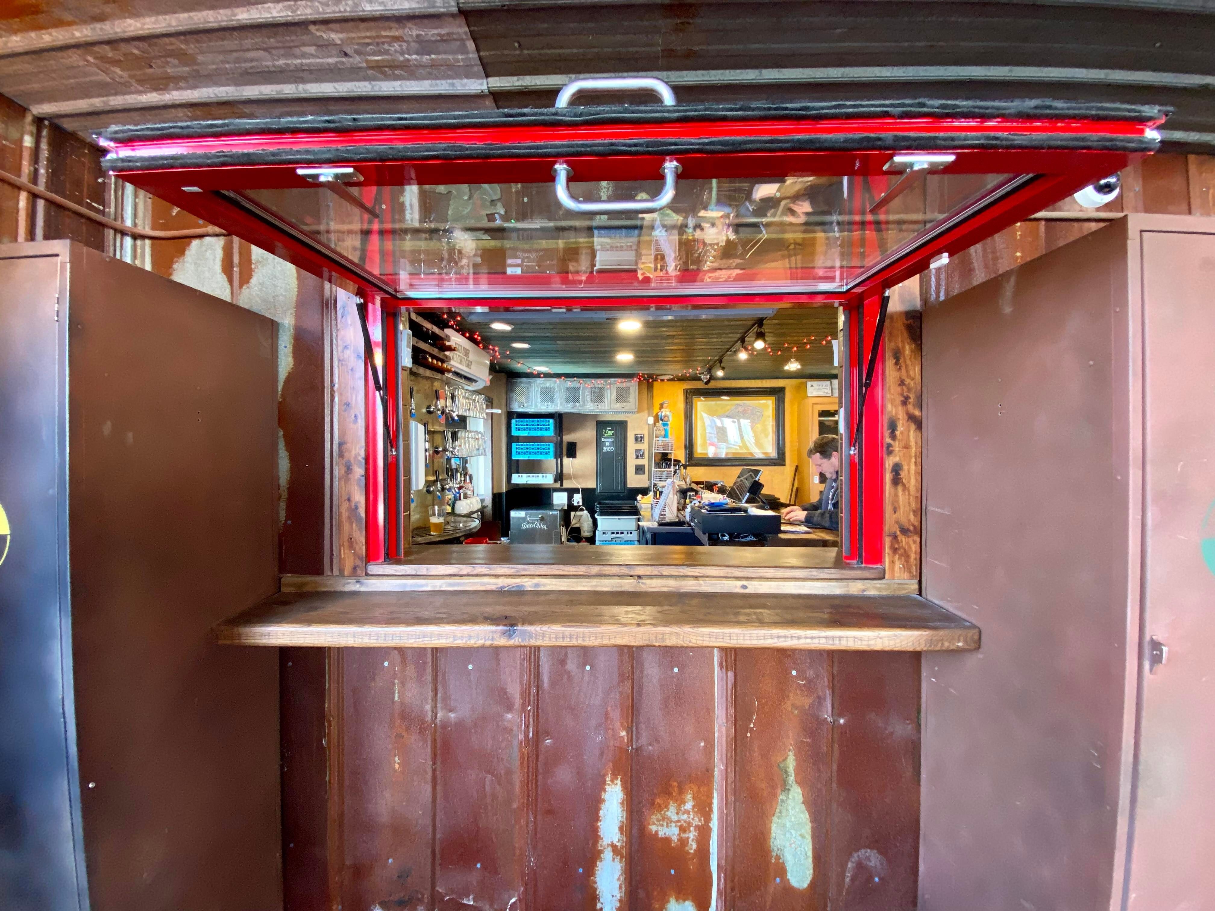 Gas Strut Window at Franklin Motors Beer Garden | ActivWall