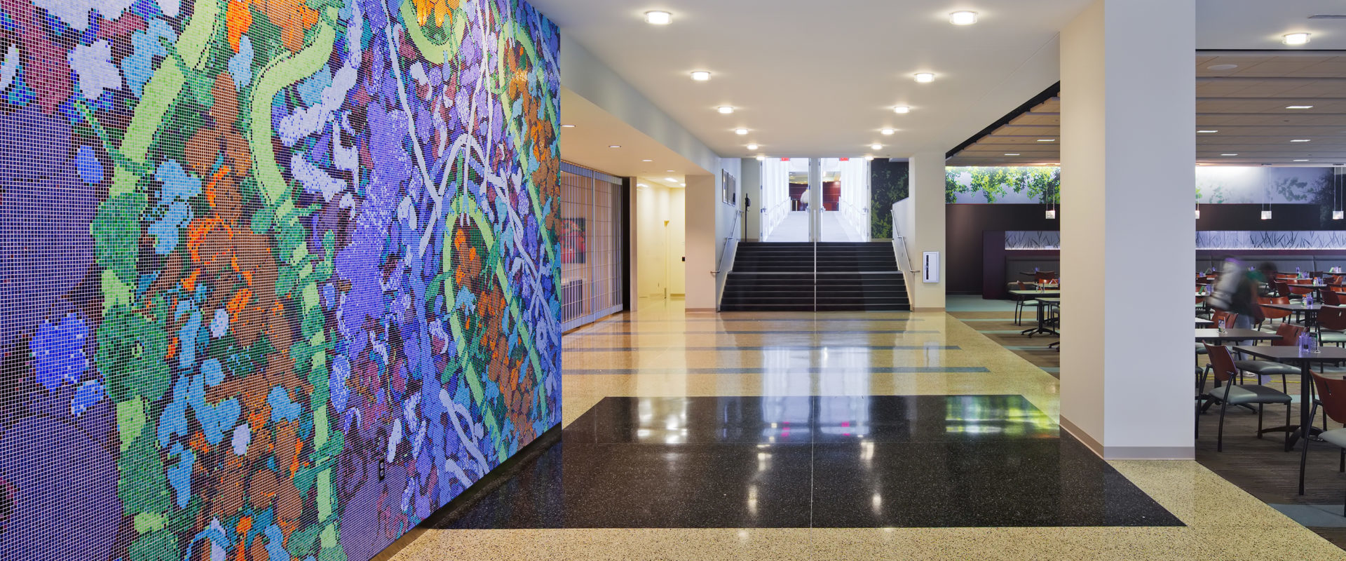 Large office hallway to the cafeteria | The Weitz Company