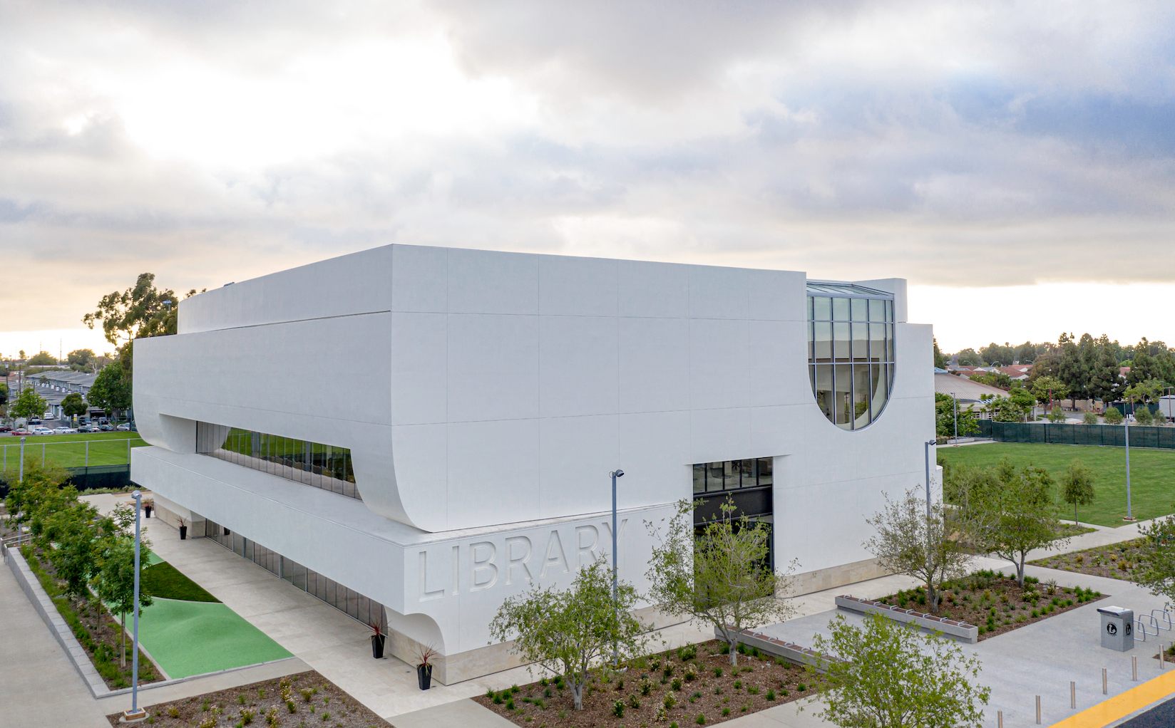 Library Courtyard and Exterior with Arching windows and glass ...