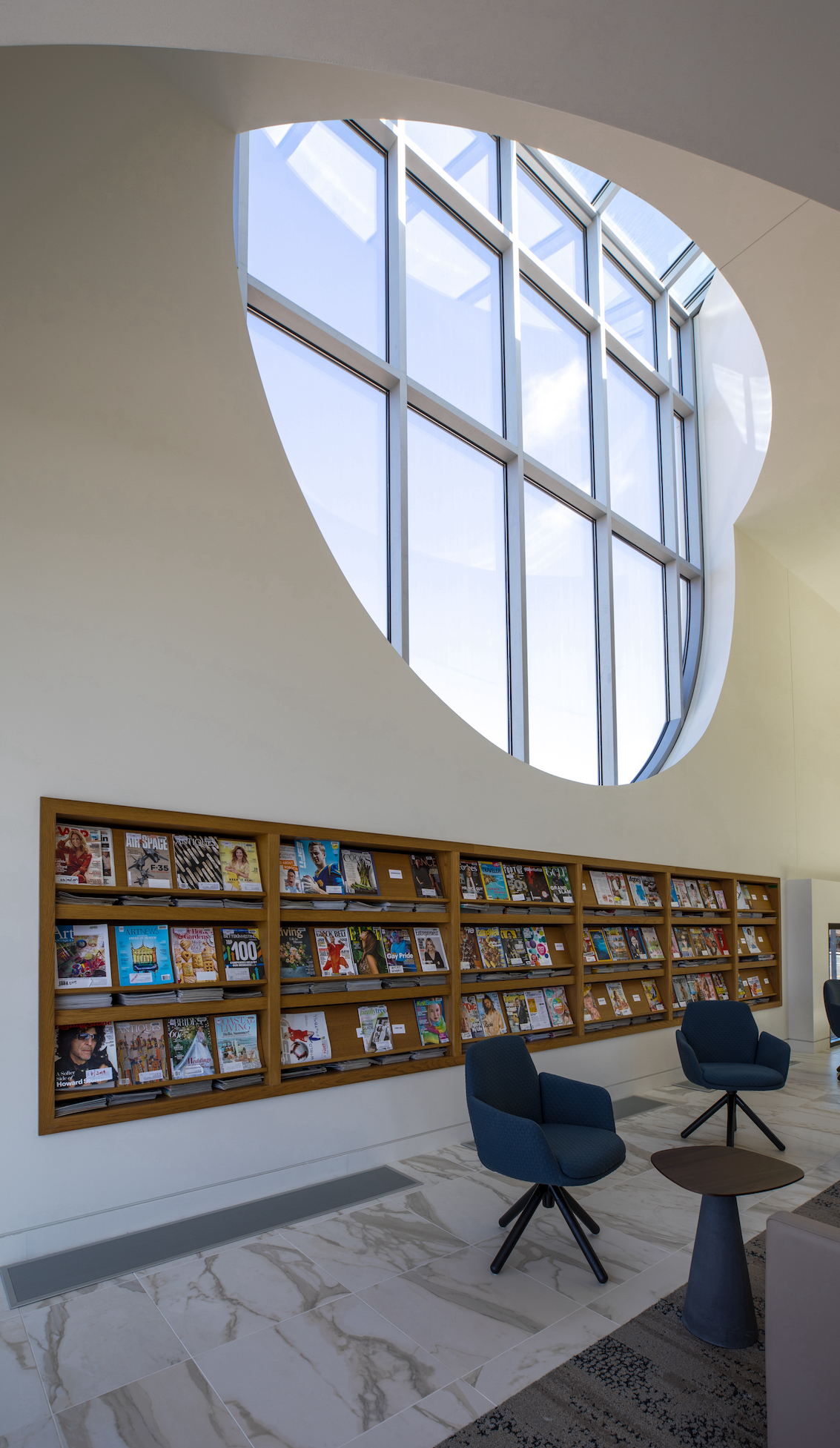 Lions Park Library arched shaped window and seating area | Giroux Glass ...