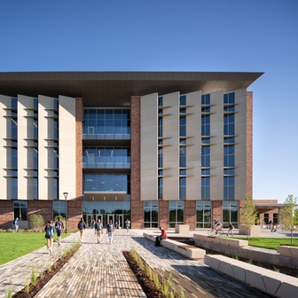 Shaded Main Education Building Entrance Outdoor Wood Seating | Gage ...