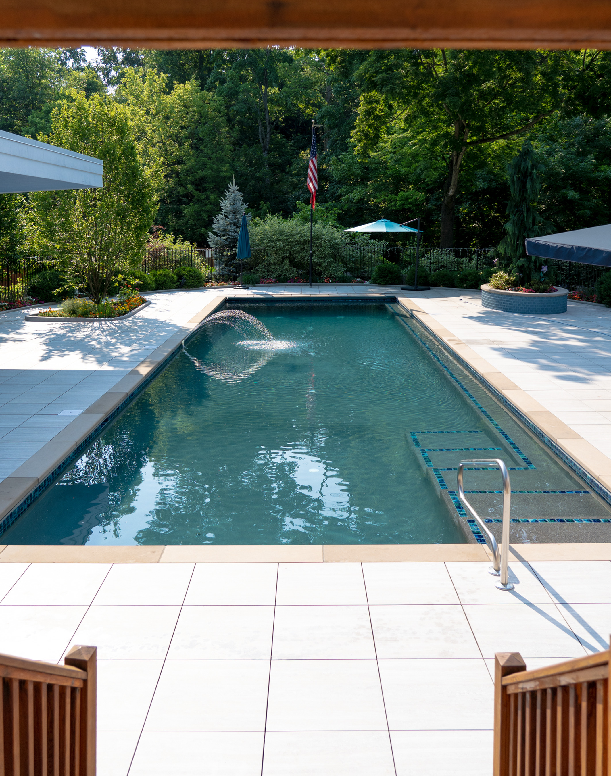 Pool Patio with Porcelain Paver Flooring Tiles | Archatrak