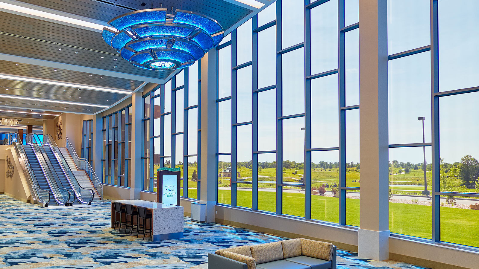 SageGlass Mystic Lake Center Interior Escalator | SageGlass