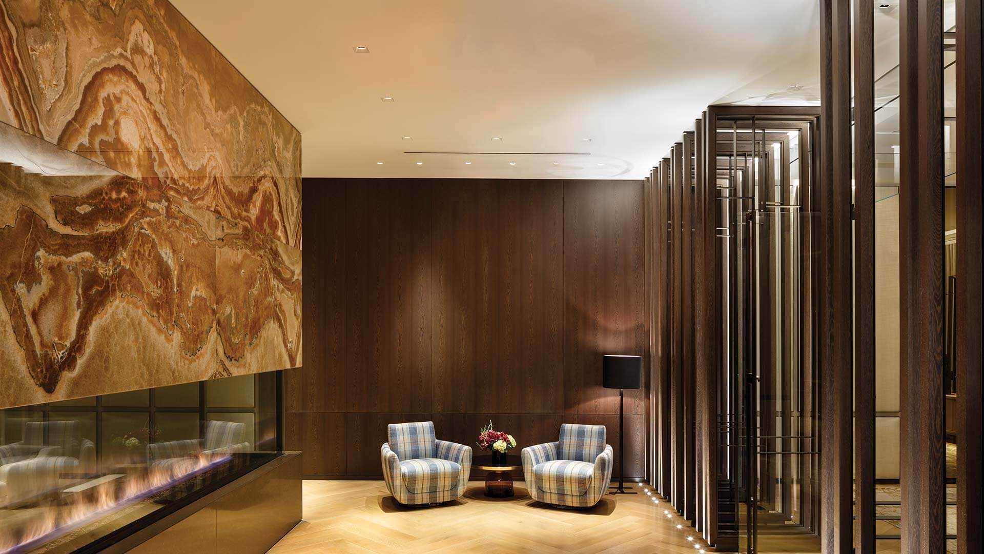 Stone Fireplace Seating Area | Acuity Brands Lighting | Acuity Brands