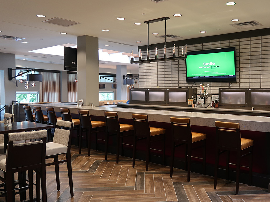 TRA Design Hilton Cincinnati Airport Public Space Renovation Bar area ...