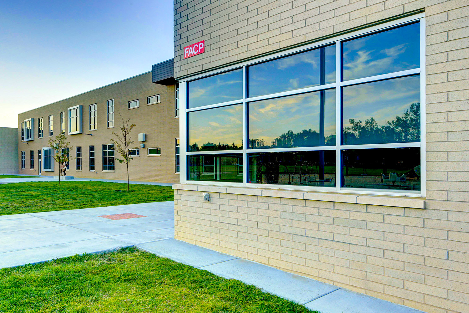 Tubelite emerald elementary school storefront windows brick facade ...