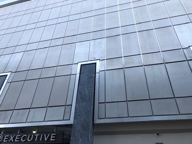 Watermark Building | Textured Exterior | QuietCoat Polymer Coating ...